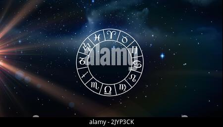 Image of wheel of zodiac signs over shining sun and stars on blue sky ...