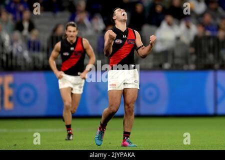 Alec Waterman of the Bombers celebrates kicking a goal during the Round ...
