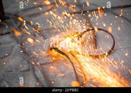 burning spark electrical outlet shorting, danger Stock Photo - Alamy