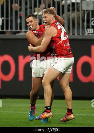 Alec Waterman of the Bombers celebrates kicking a goal during the Round ...