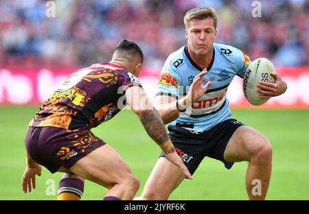 Teig Wilton (right) of the Sharks takes on Kotoni Staggs (left) of the ...