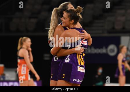 Lara Dunkley and Gretel Bueta of the Firebirds celebrate victory during ...