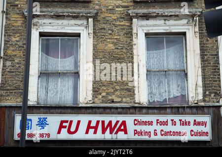 grimy, dilapidated and rundown building above a Chinese takeaway in ...
