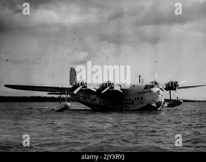 Qantas Empire Airway Flying Boat, "Cooee", taxis to the morning at Rose ...