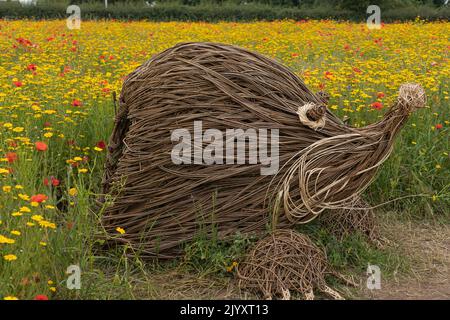 Wildflower meadows with animals' characters made of wicker Stock Photo ...