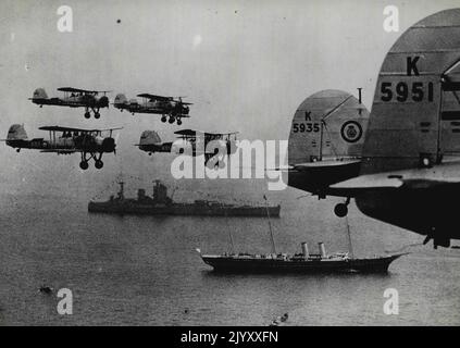 The King Reviews His Fleet At Spithead - The Royal yacht "Victoria and Albert", passing the ...