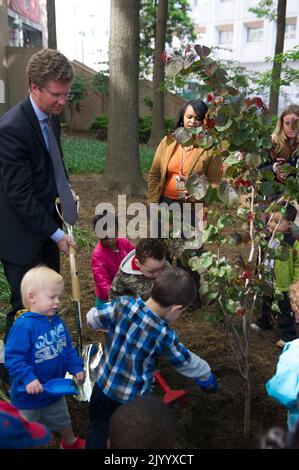Secretary Shaun Donovan leading Earth Day planting activities with ...