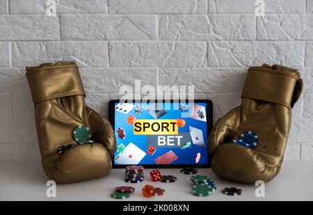 boxing gloves and smartphone with bets Stock Photo - Alamy