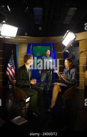 Secretary Shaun Donovan giving interview, tour of HUD headquarters, to ...