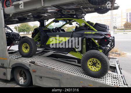 Transportation of buggy racing cars on a car carrier Stock Photo - Alamy