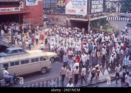 Crowd coming out of Church Gate Railway Station, Bombay Stock Photo - Alamy