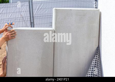 installation of a L-Stone at the concrete bed with contact to the knob ...