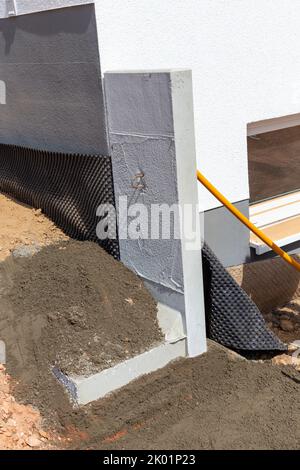 installation of a L-Stone at the concrete bed with contact to the knob ...