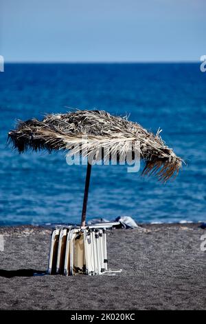 Stones at the famous beach of Perissa in Santorini Greece Stock Photo ...