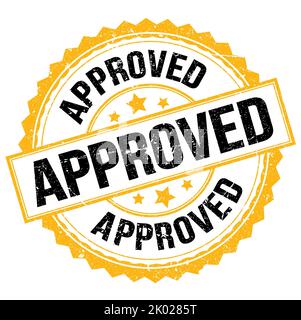 APPROVED text written on yellow-black round stamp sign Stock Photo - Alamy