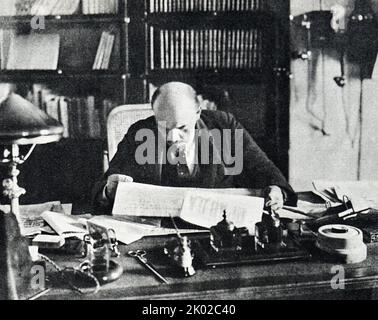 Vladimir Lenin at his desk in his office in the Kremlin. 1918, Moscow ...