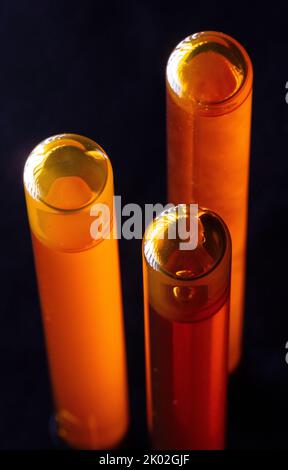 Yellow viscous liquid sunflower lecithin with bubbles in a transparent ...