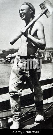 Propaganda photograph showing soviet construction workers during the ...