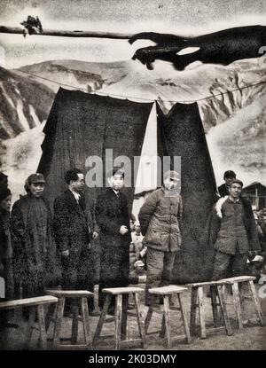 Ren Bishi, Mao Zedong and Zhou Enlai in front of the cave dwelling in ...