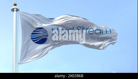 Greifswald, GER, September 2022: Flag with the Nord Stream logo waving ...