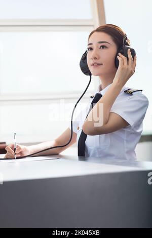 Chinese air traffic controller in tower Stock Photo - Alamy