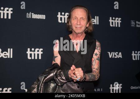 Actor Paul Raci poses for a photograph on the red carpet for the film ...