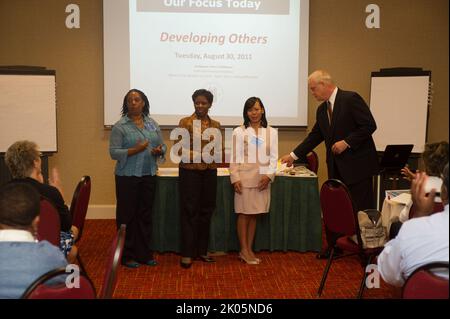 HUD managers meeting: attendees, "Developing Others" workshop Stock ...