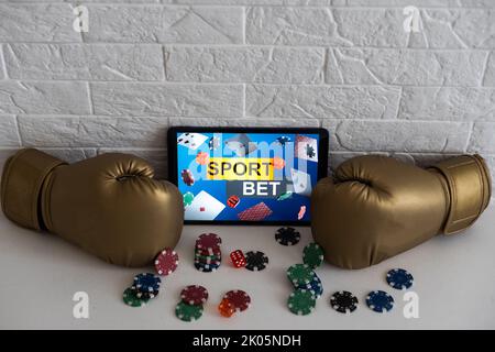 boxing gloves and smartphone with bets Stock Photo - Alamy