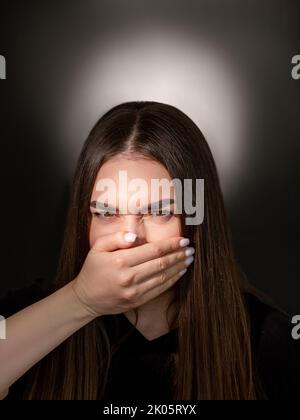 keep quiet female mystery woman showing shhh Stock Photo - Alamy