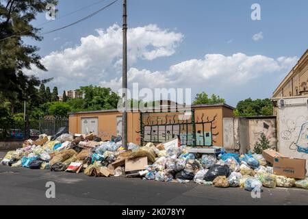 A huge heap of domestic refuse on a street in Catania, Sicily, Italy ...