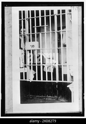 female behind prison bars Stock Photo - Alamy