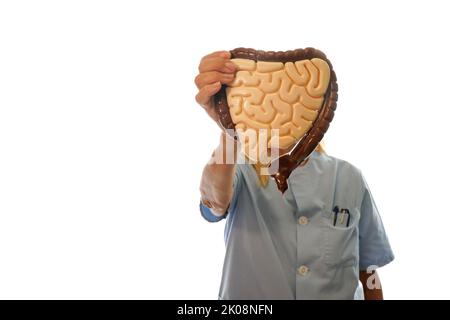 Nurse with a plastic intestine. White background Stock Photo - Alamy