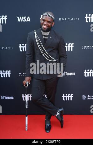 Sivuyile Ngesi arriving to "The Woman King" premiere during the 2022 Toronto International Film ...