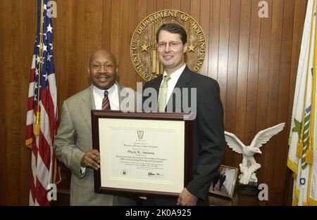 Secretary Alphonso Jackson with Mark Johnston, Jean Lin Pao, and Walter ...