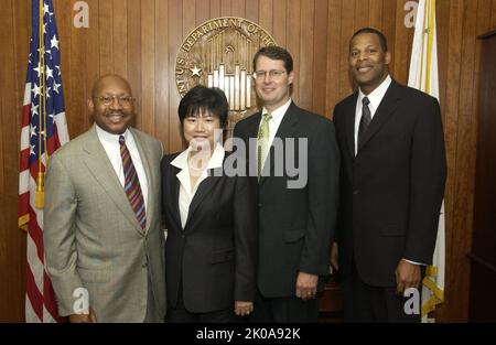 Secretary Alphonso Jackson with Mark Johnston, Jean Lin Pao, and Walter ...