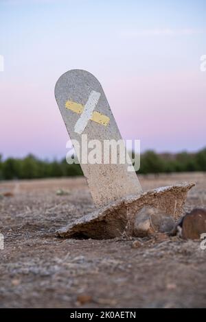 yellow paint marked walking path sign indicating to climb the stairs ...