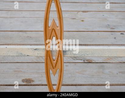 Carved wooden rail. Beautiful handrails. Wooden decoration on the fence ...