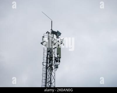 Cell tower. Modern technologies. Reception of signals. Mobile connection. Antenna against the ...