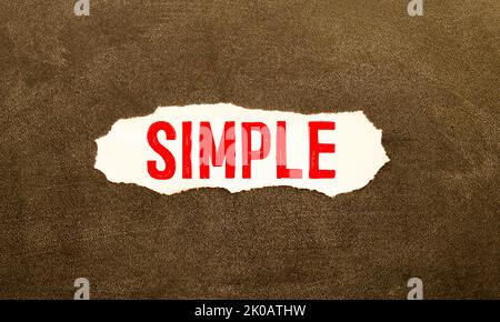 Keep it simple words on wooden blocks on dark gray background. Business ...