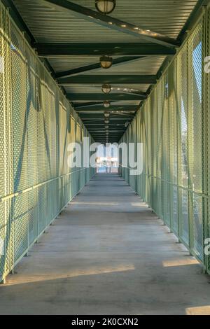 Inside of a modern overhead pedestrian bridge Stock Photo - Alamy