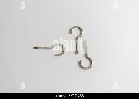 Question mark hook screws isolated on a white background with copy ...