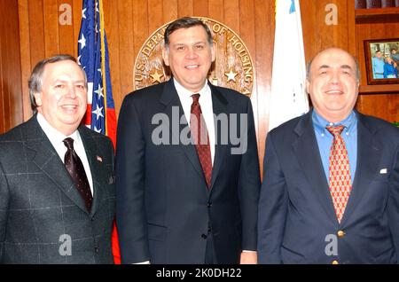 Secretary Mel Martinez with Dr. Rafael Diaz and Octavio Ledon ...