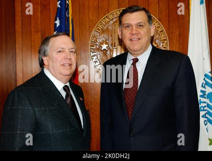 Secretary Mel Martinez with Dr. Rafael Diaz and Octavio Ledon ...