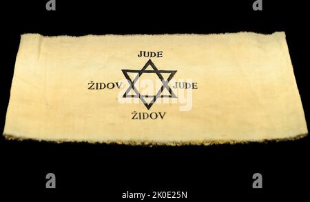 Armband worn by Jewish inmates of the Warsaw Ghetto, the largest of the ...