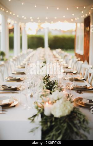 wedding tables during ceremony Stock Photo - Alamy