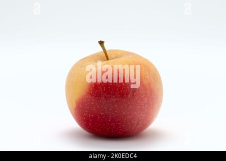 Apple on white background, cropped image Stock Photo - Alamy