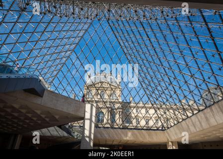 View of the Louvre from the underground lobby of the Louvre pyramid of ...