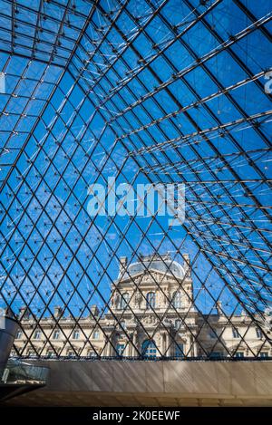 View of the Louvre from the underground lobby of the Louvre pyramid of ...