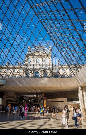 View of the Louvre from the underground lobby of the Louvre pyramid of ...