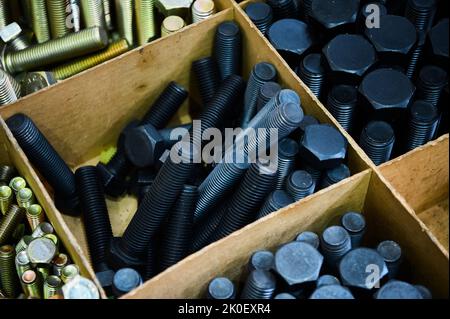 Hardened blued bolts for fastening in cells of plywood crate Stock ...